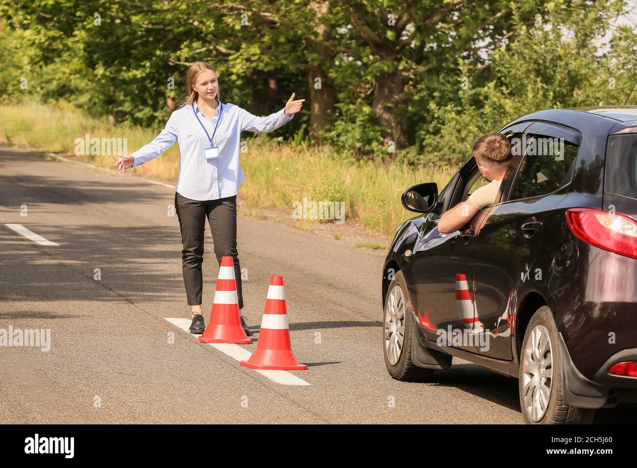 Instructor conducting driver licence test Stock Photo - Alamy