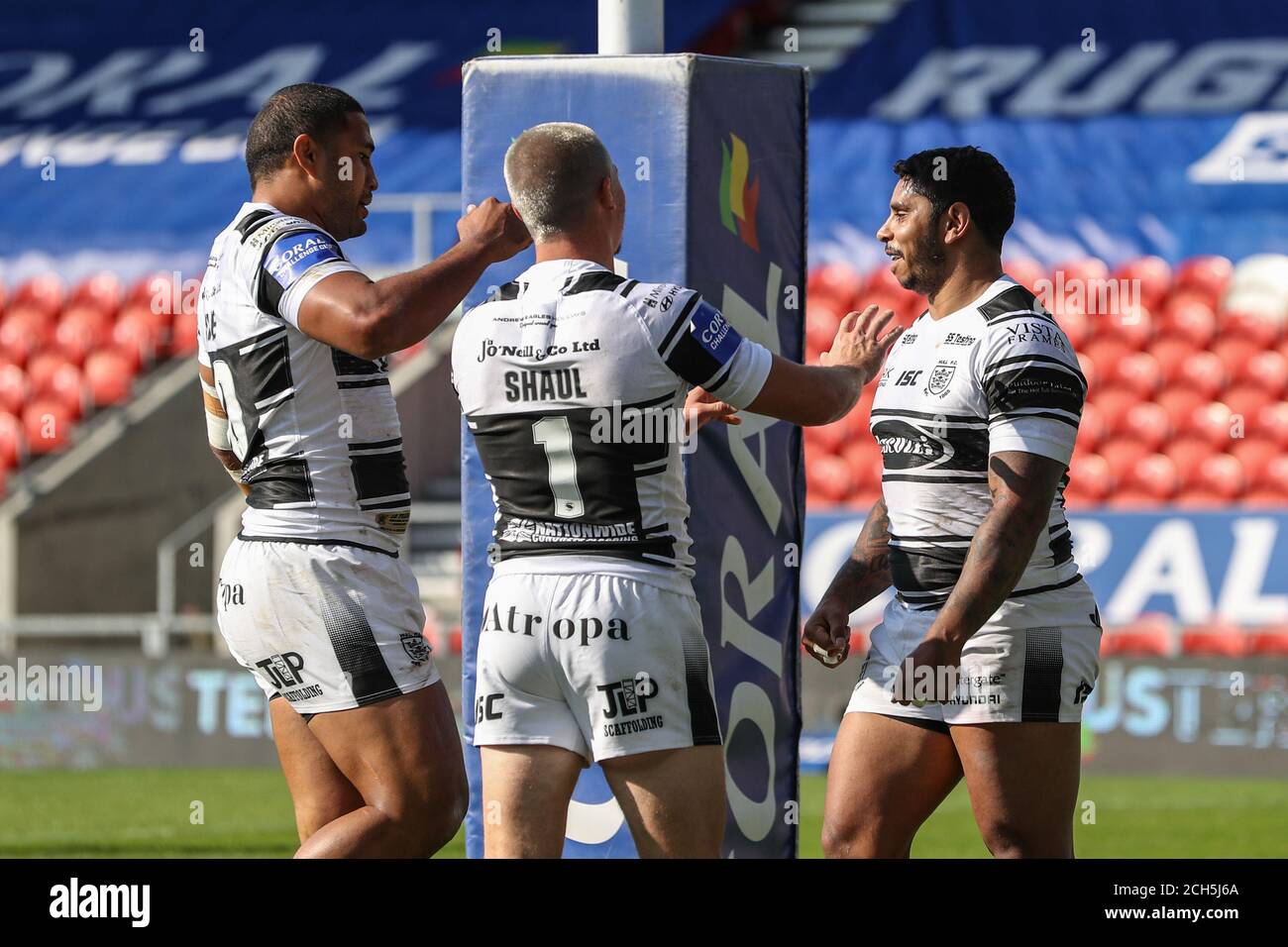 Albert Kelly (14) of Hull FC celebrates his try with Jamie Shaul (1) of ...
