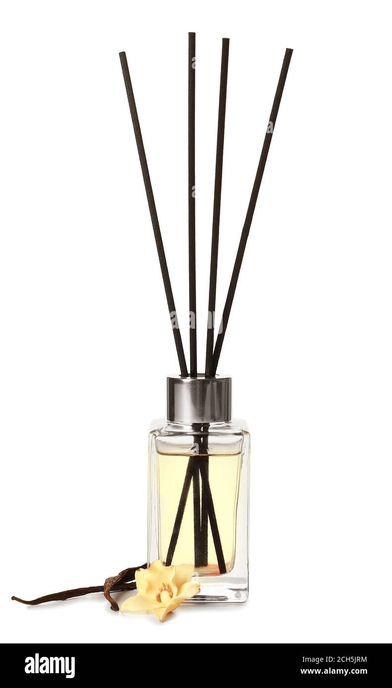 Vanilla reed diffuser on white background Stock Photo - Alamy