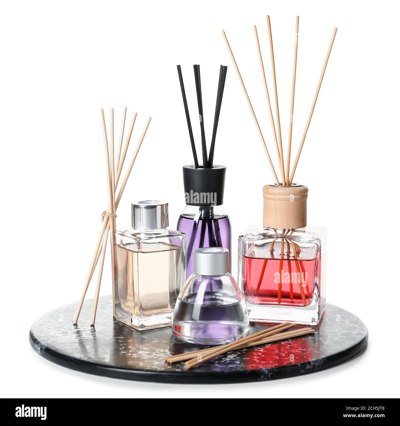 Different reed diffusers on white background Stock Photo - Alamy