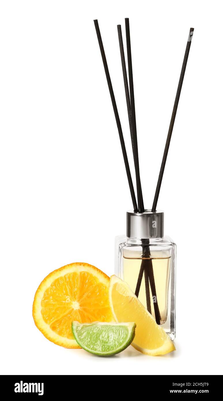 Citrus reed diffuser on white background Stock Photo - Alamy