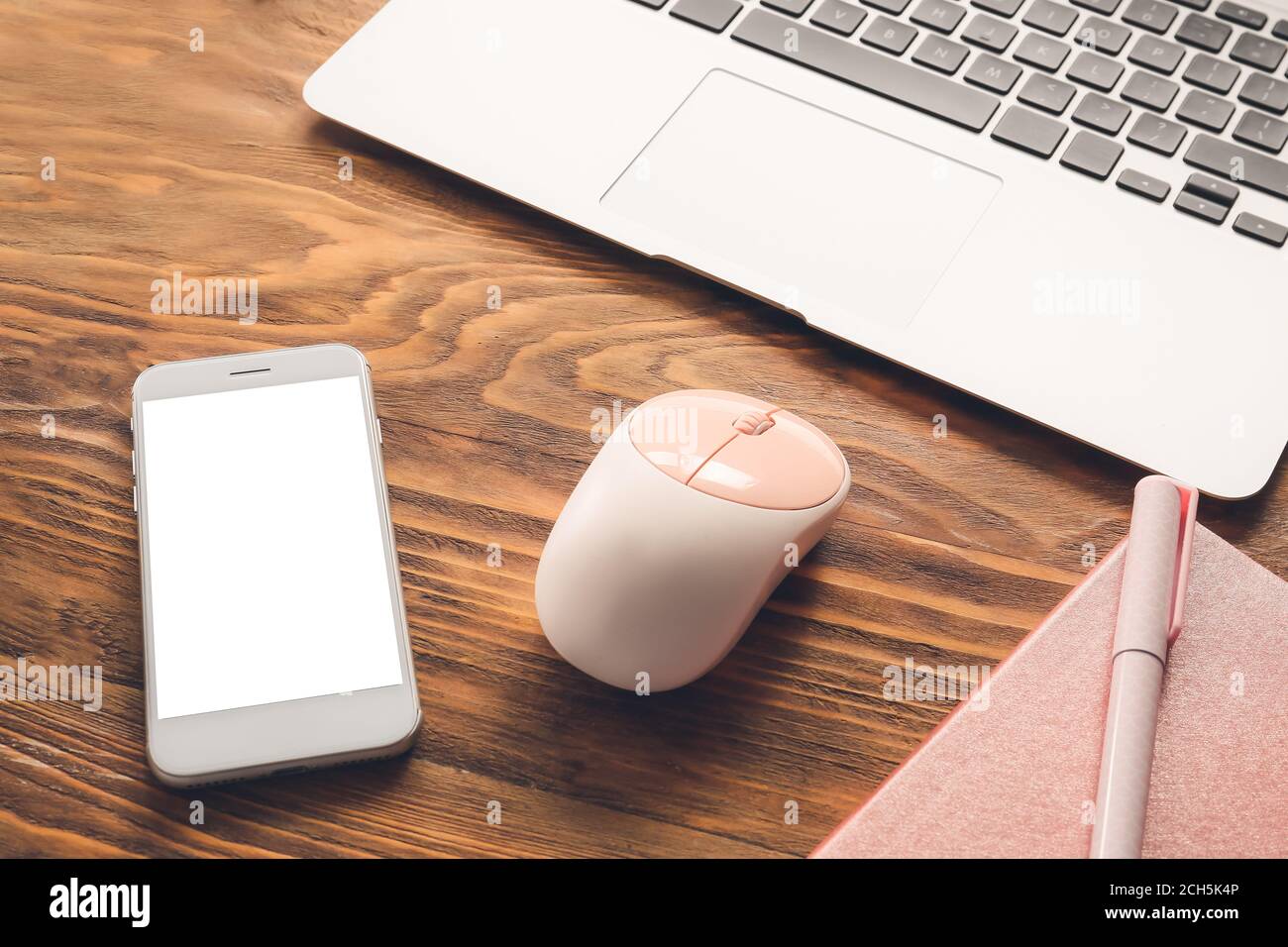 View of modern workplace with laptop, PC mouse and smartphone Stock ...