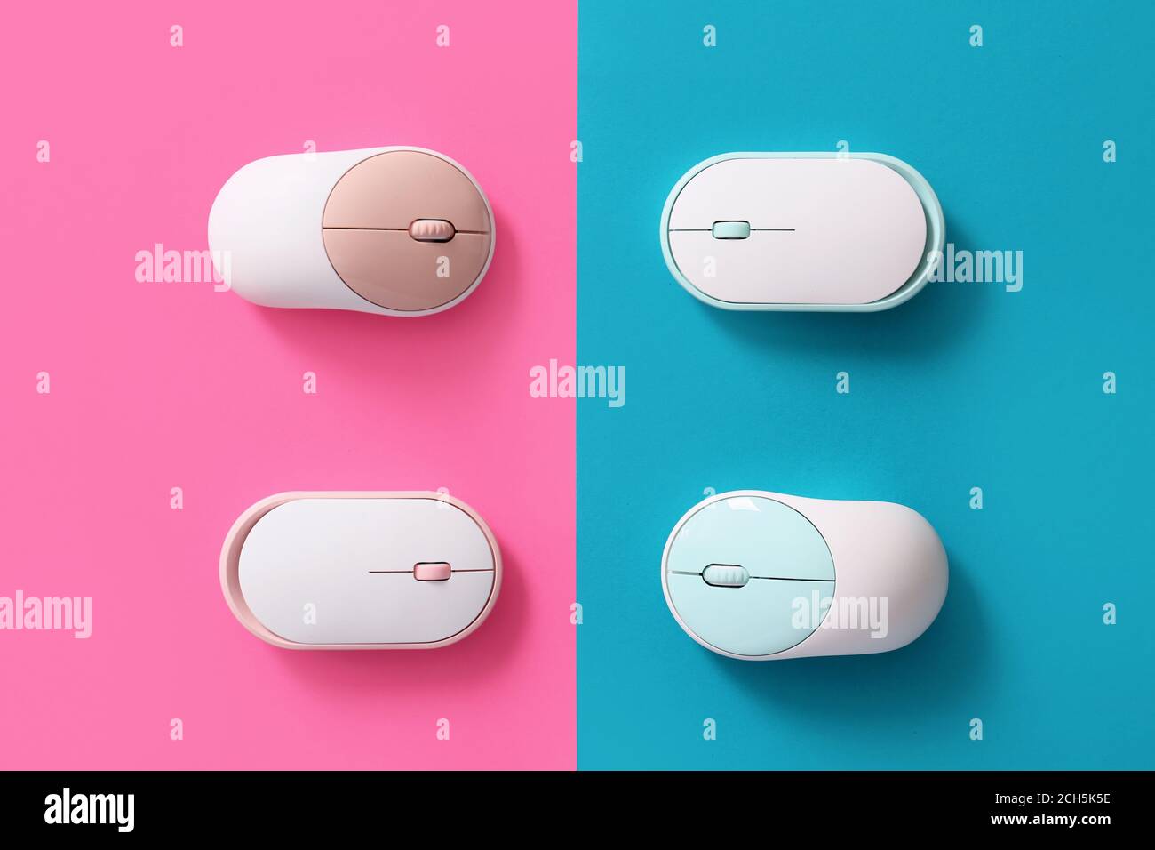 Modern PC mouse devices on color background Stock Photo - Alamy