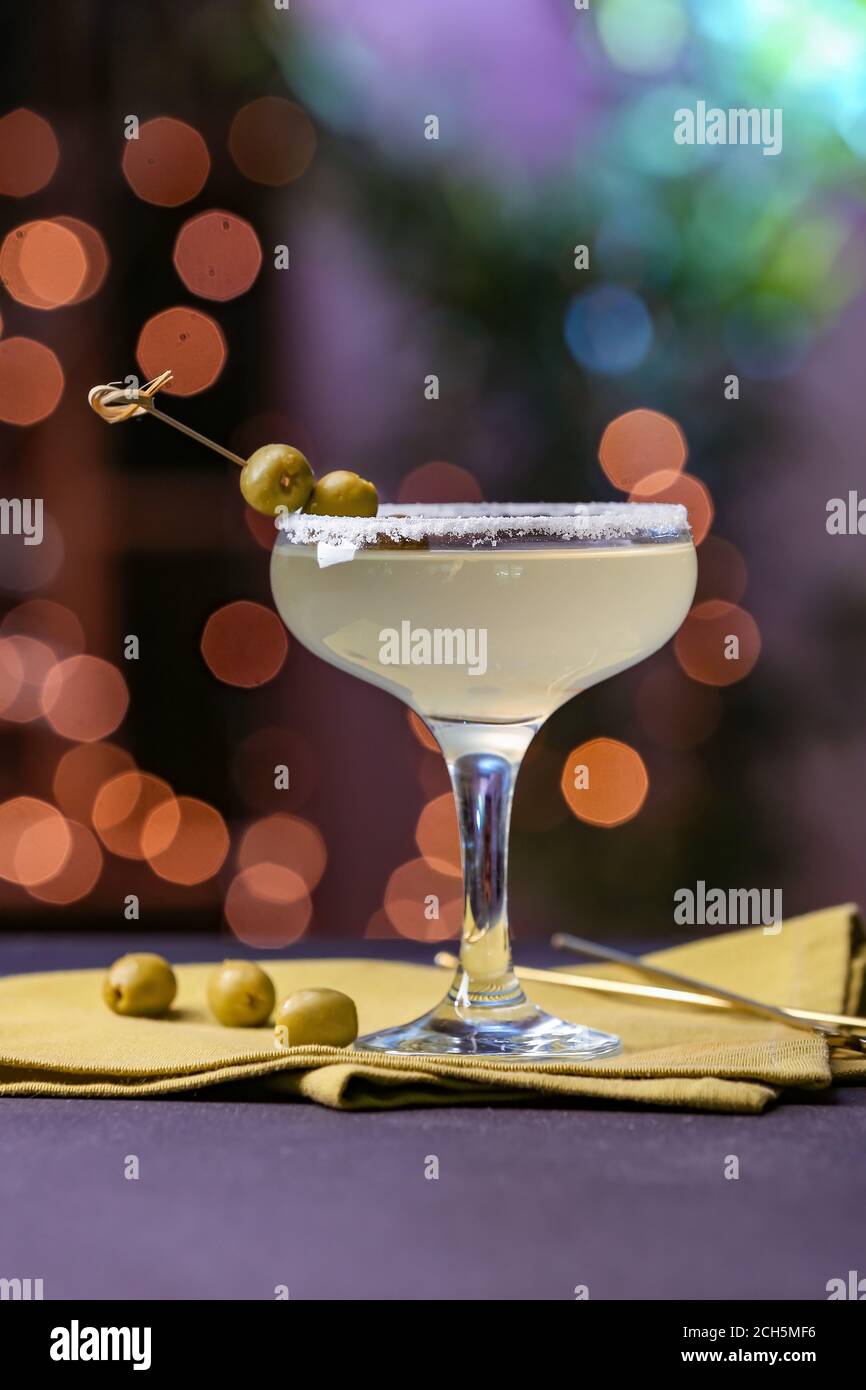 Glass of fresh martini on dark background Stock Photo - Alamy