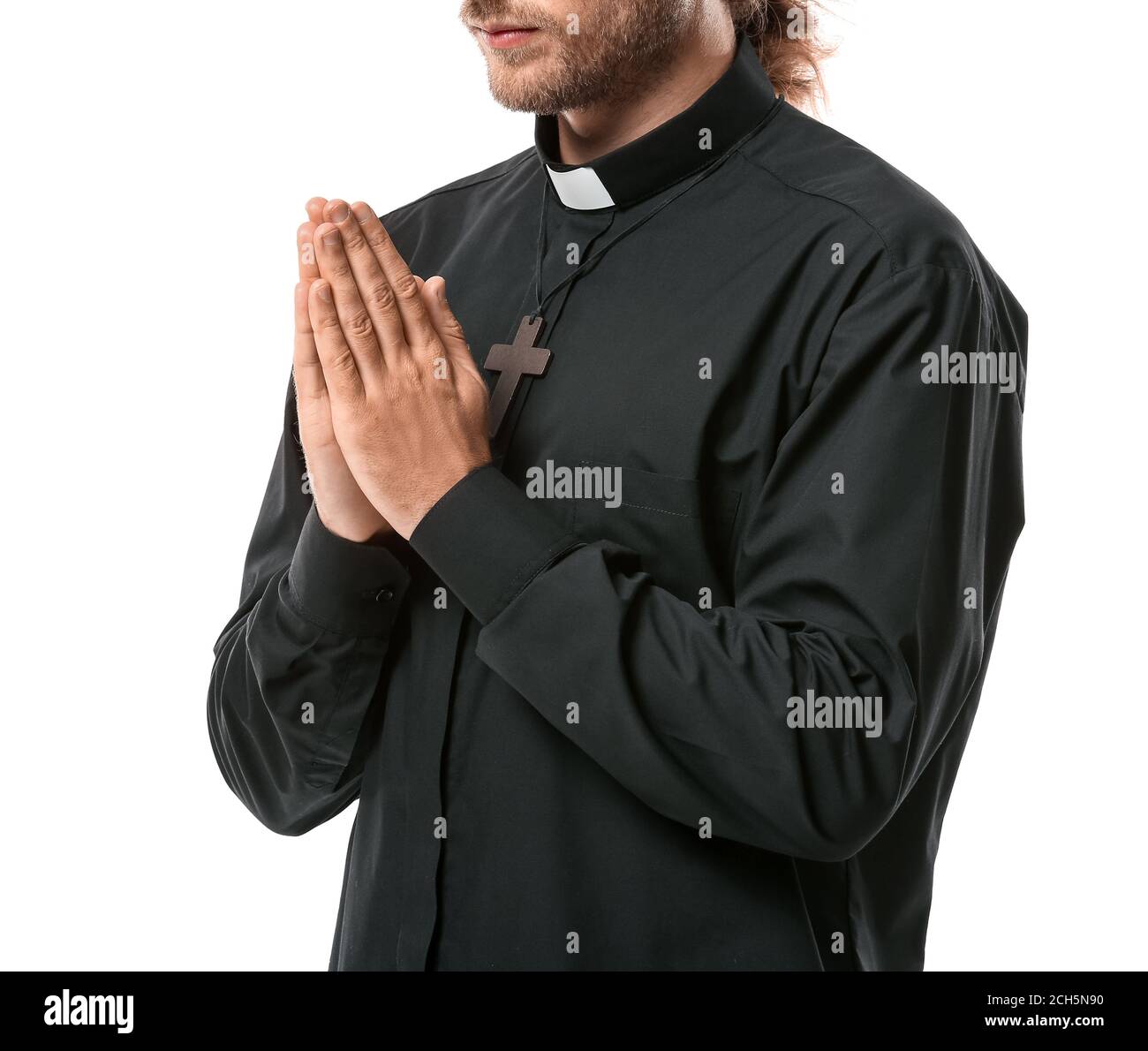 Praying priest on white background Stock Photo - Alamy