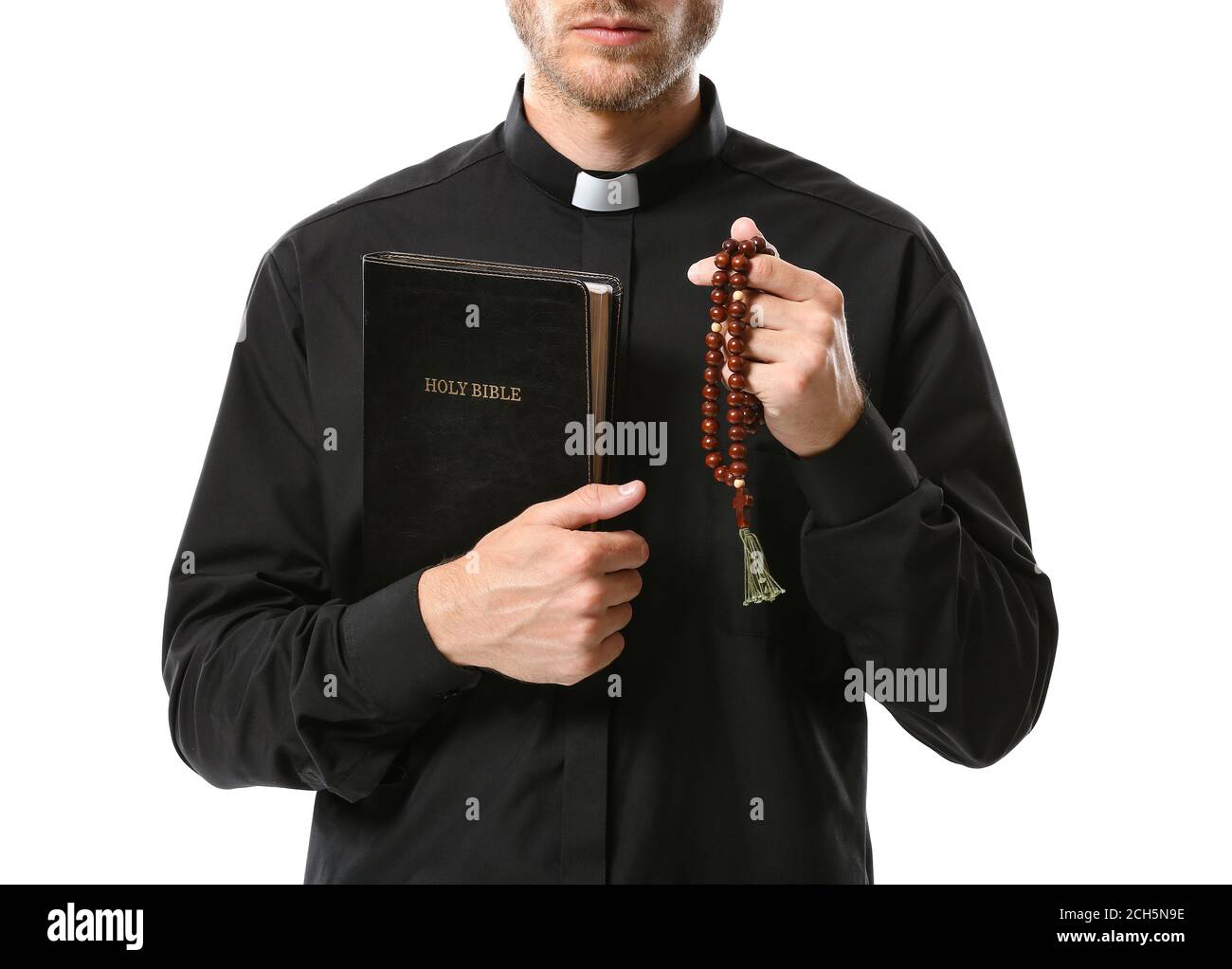 Handsome priest with Bible and rosary beads on white background Stock ...