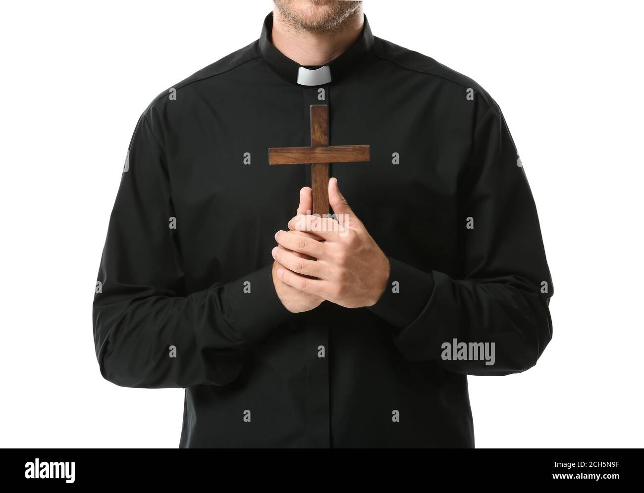 Male priest with cross on white background Stock Photo - Alamy