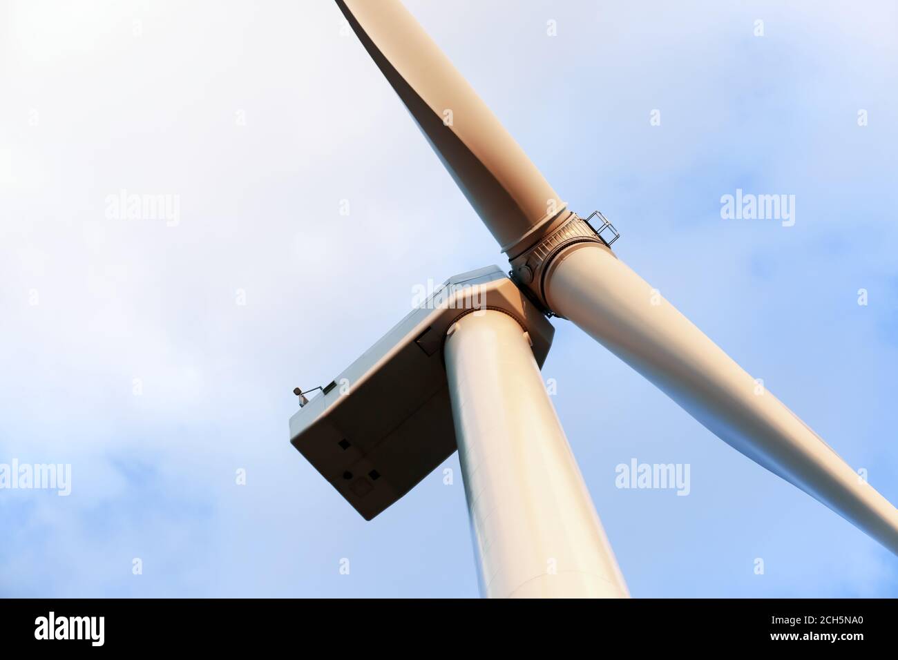 Windmill for electric power on sky background Stock Photo - Alamy