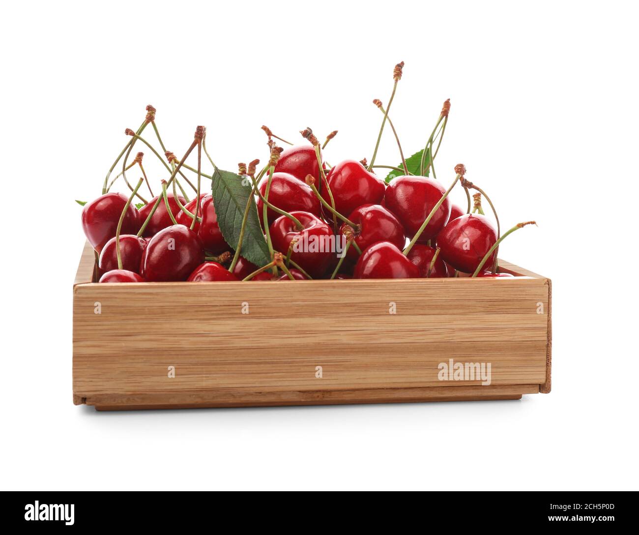 Box with sweet cherry on white background Stock Photo - Alamy