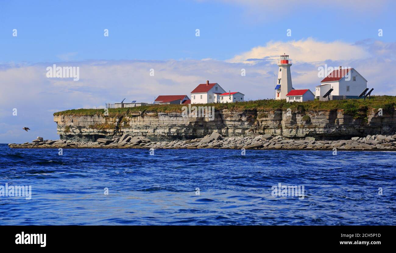 Perroquets Island and lighthouse, Mingan Archipelago in Quebec, Canada ...