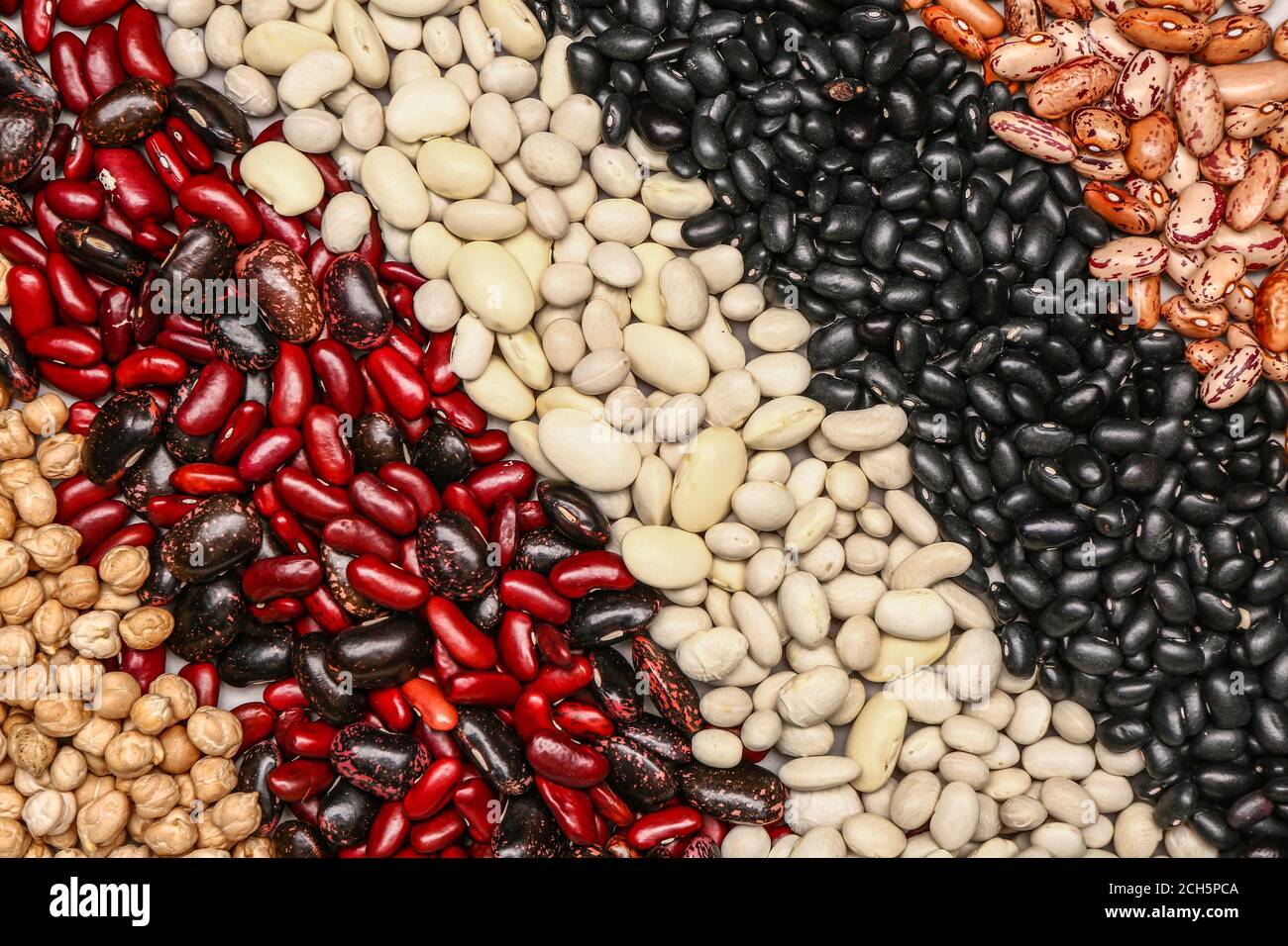 Different raw legumes as background Stock Photo - Alamy