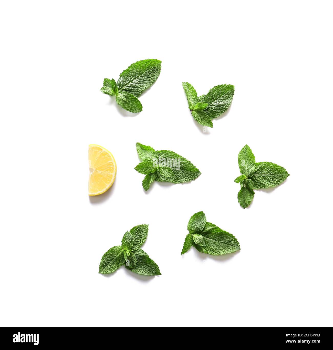 Fresh green mint and lemon on white background Stock Photo - Alamy
