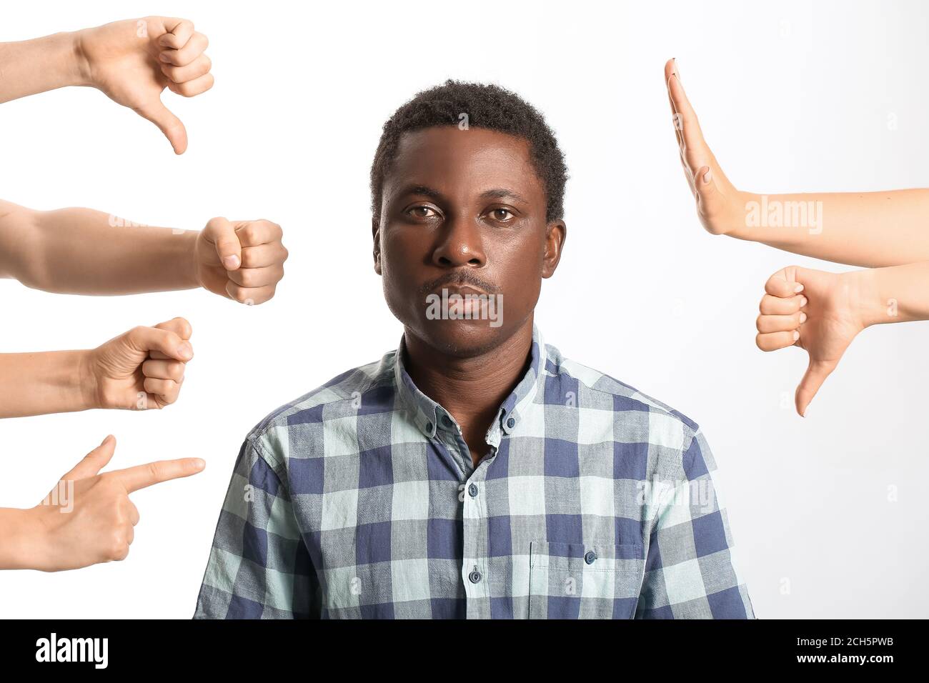 People bullying African-American man on white background. Stop racism ...