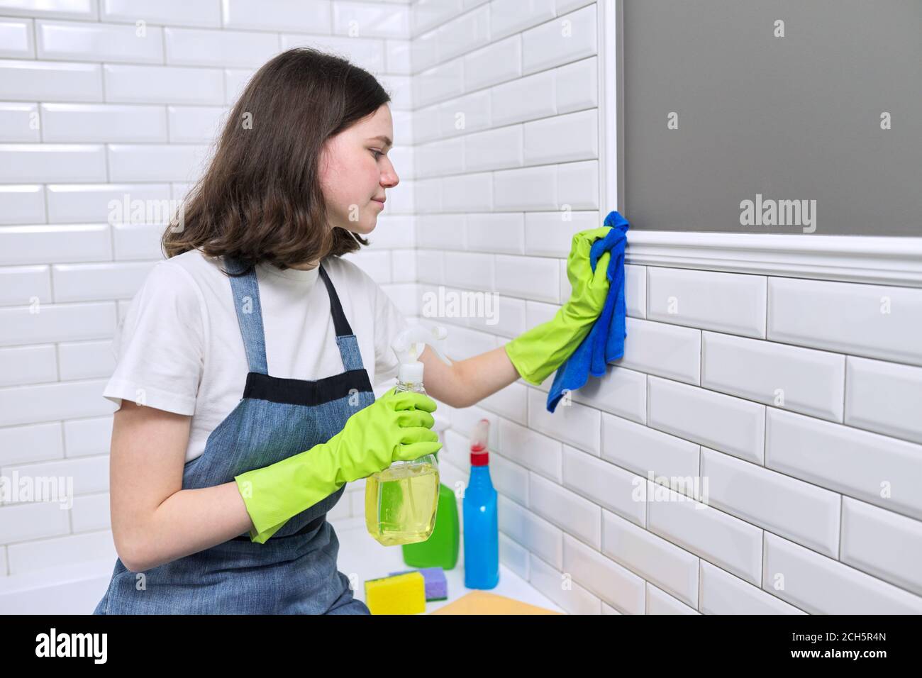 Teenager girl doing housework hi-res stock photography and images - Alamy