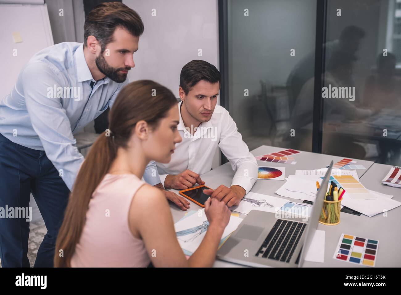 Bending over table hi-res stock photography and images - Alamy
