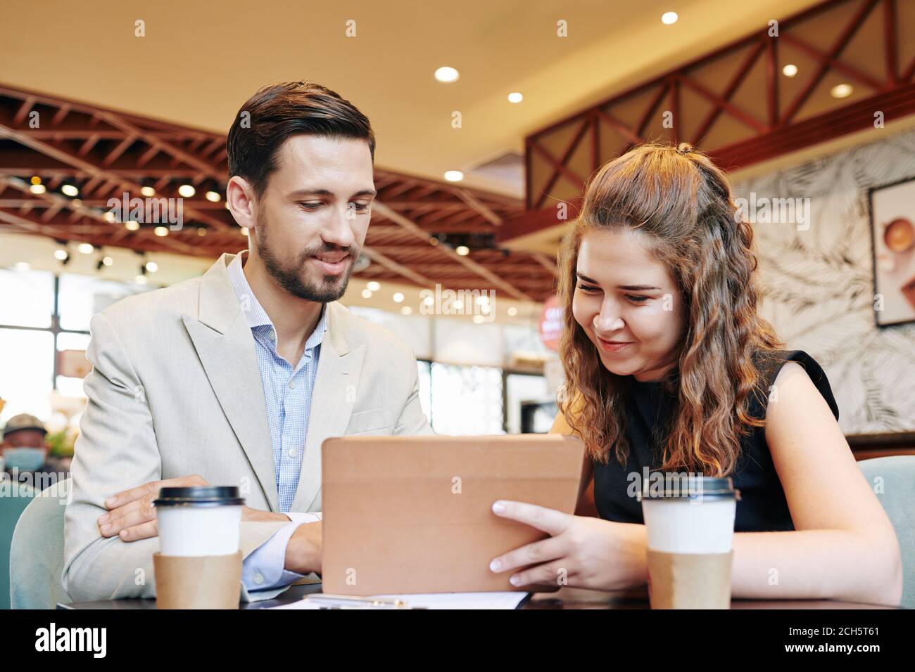 Business people watching presentation Stock Photo - Alamy Business people watching presentation Stock Photo - Alamy