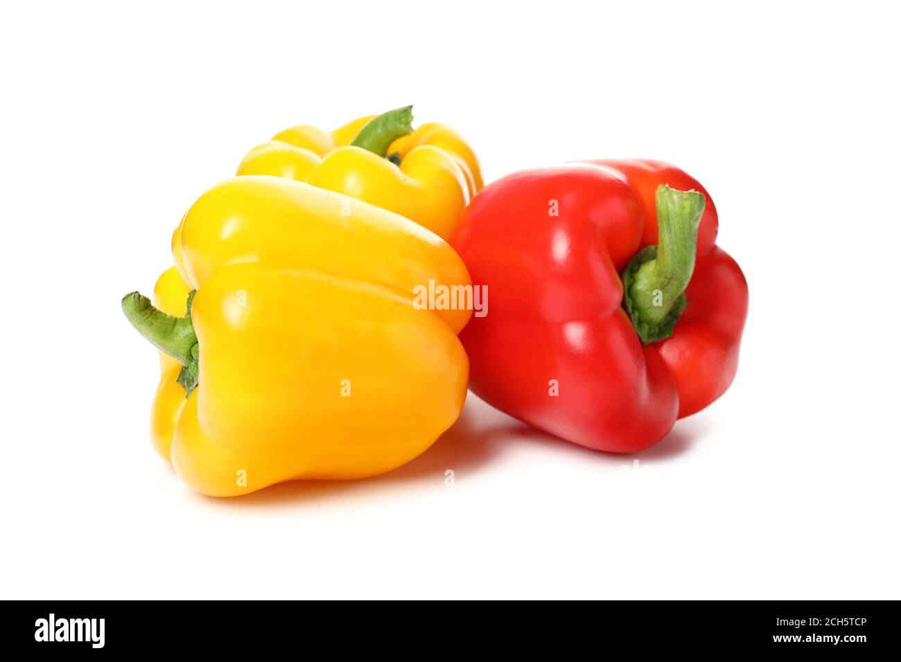 Fresh bell peppers on white background Stock Photo - Alamy