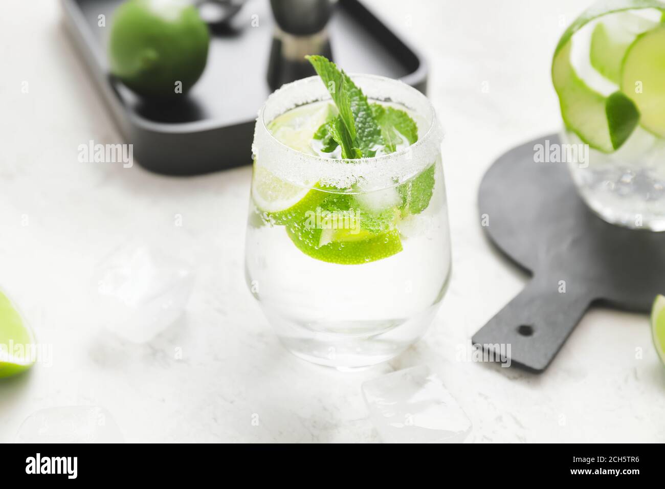 Glasses of fresh mojito on table Stock Photo - Alamy