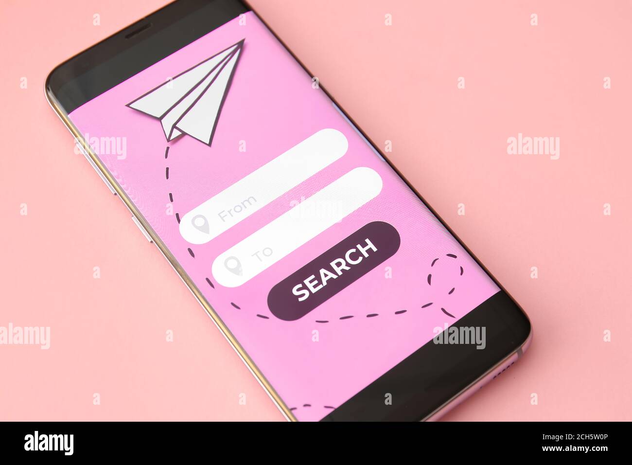 Open page of online booking service on screen of mobile phone on color ...