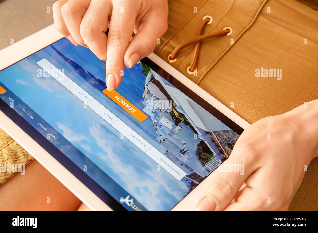 Woman with tablet computer booking tickets online, closeup Stock Photo ...