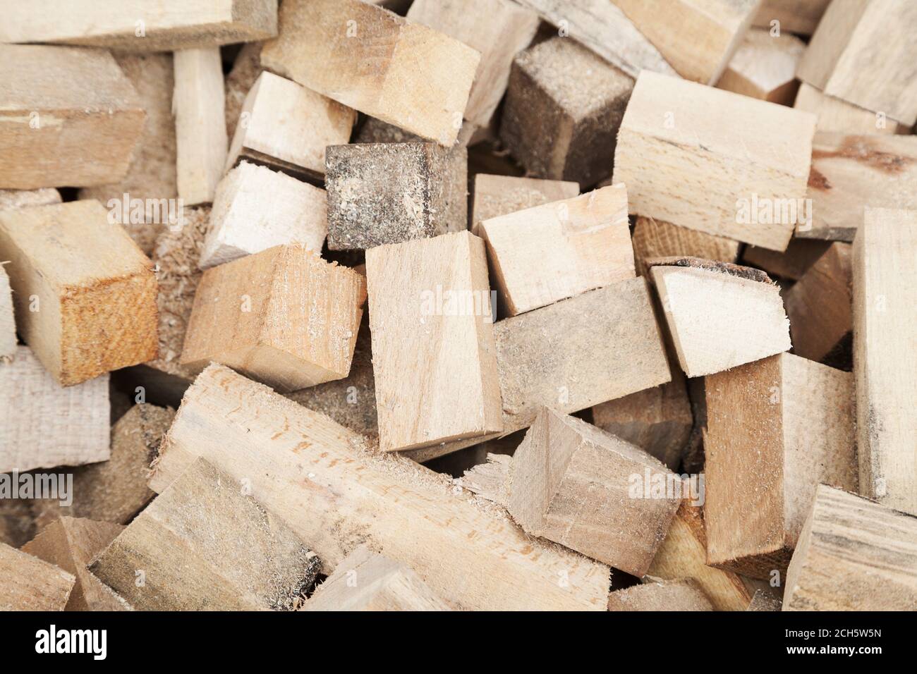 Bunch of cut wooden blocks with selective focus Stock Photo - Alamy
