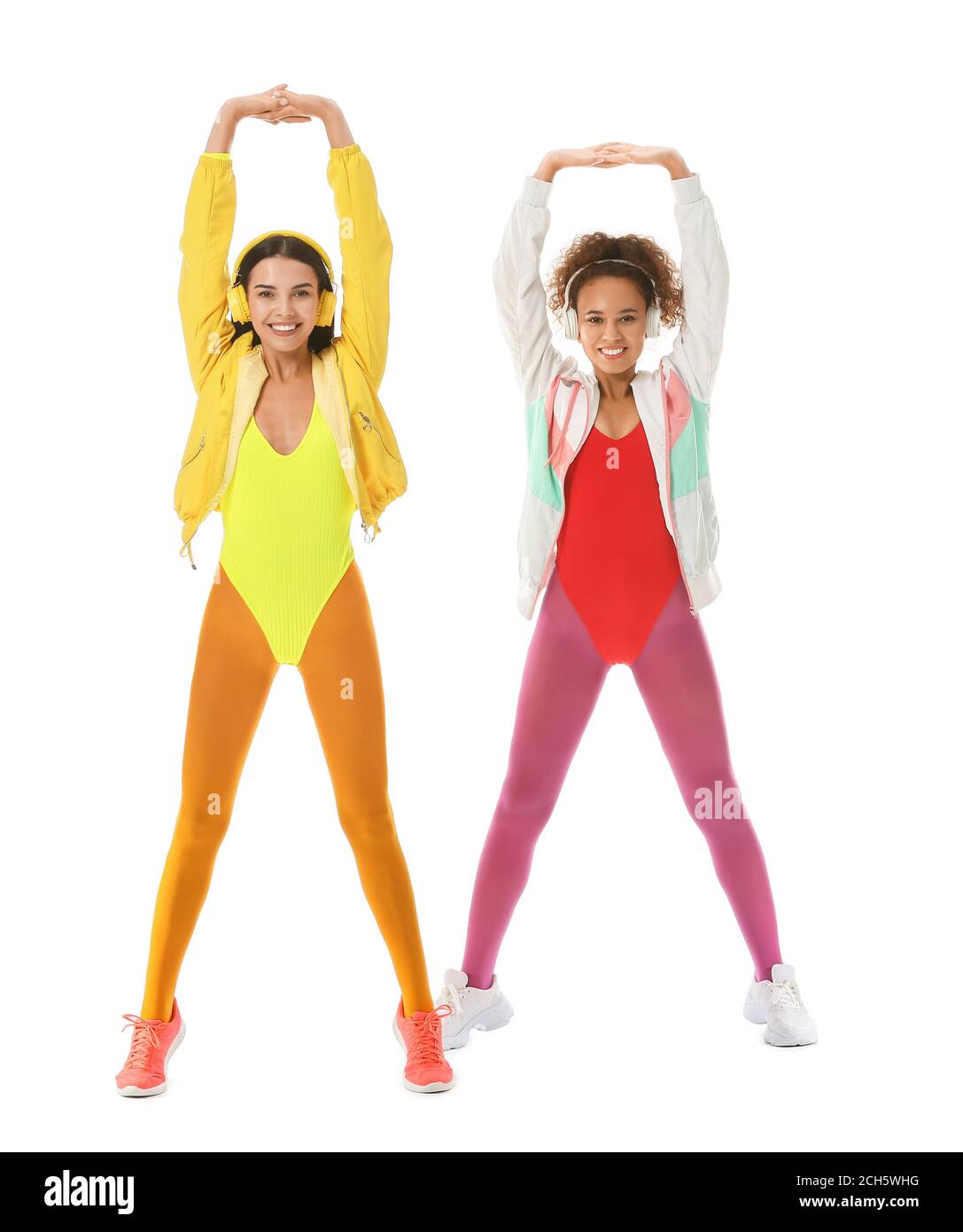Young women doing aerobics on white background Stock Photo - Alamy