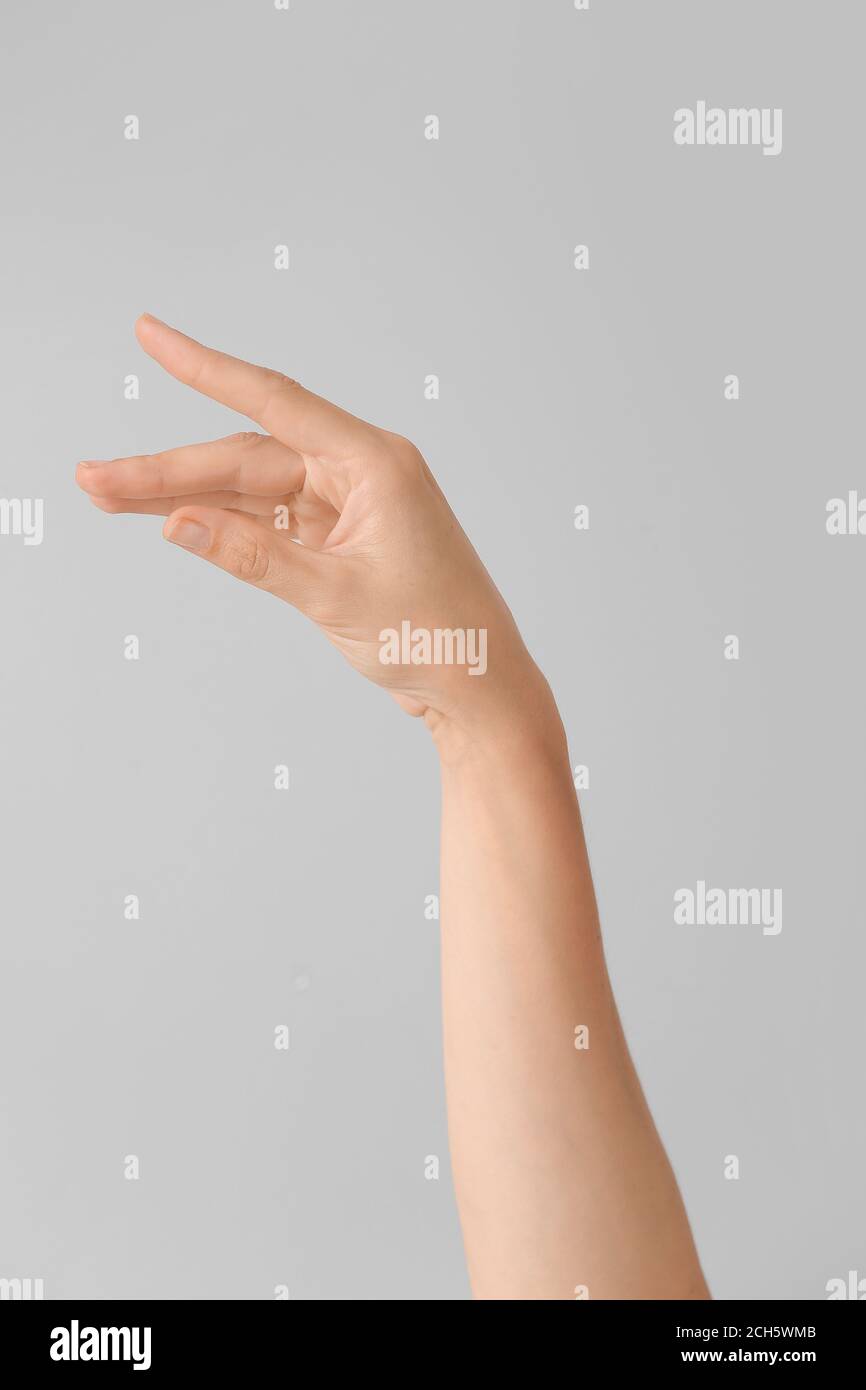 Hand showing letter P on grey background. Sign language alphabet Stock ...