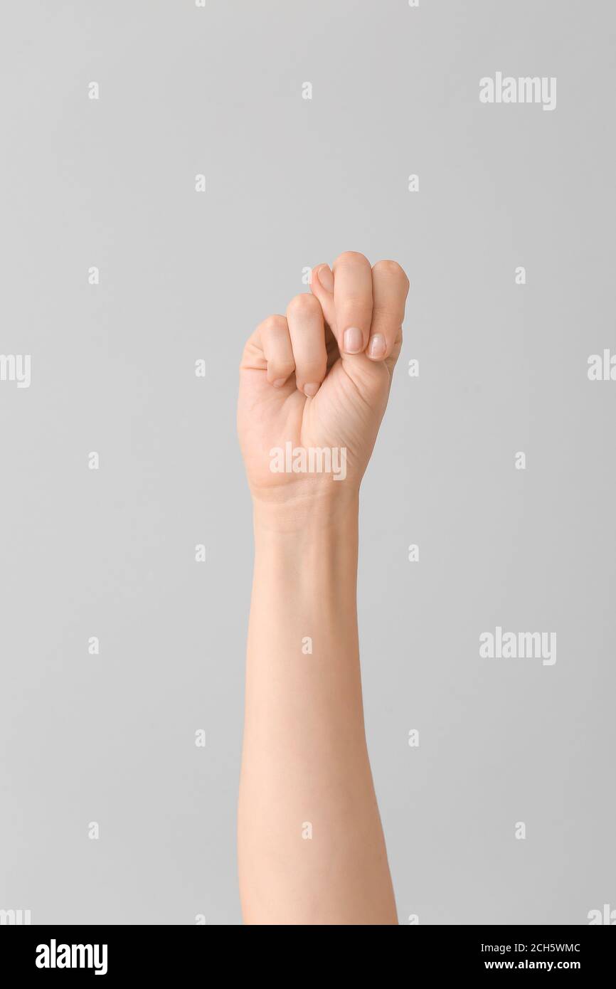 Hand showing letter N on grey background. Sign language alphabet Stock ...
