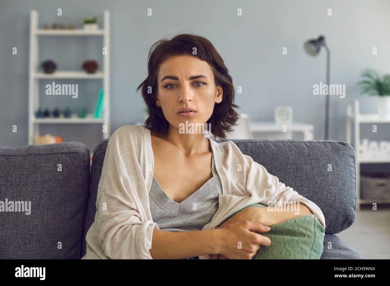 Young woman waiting for internet connection during online meeting Stock ...