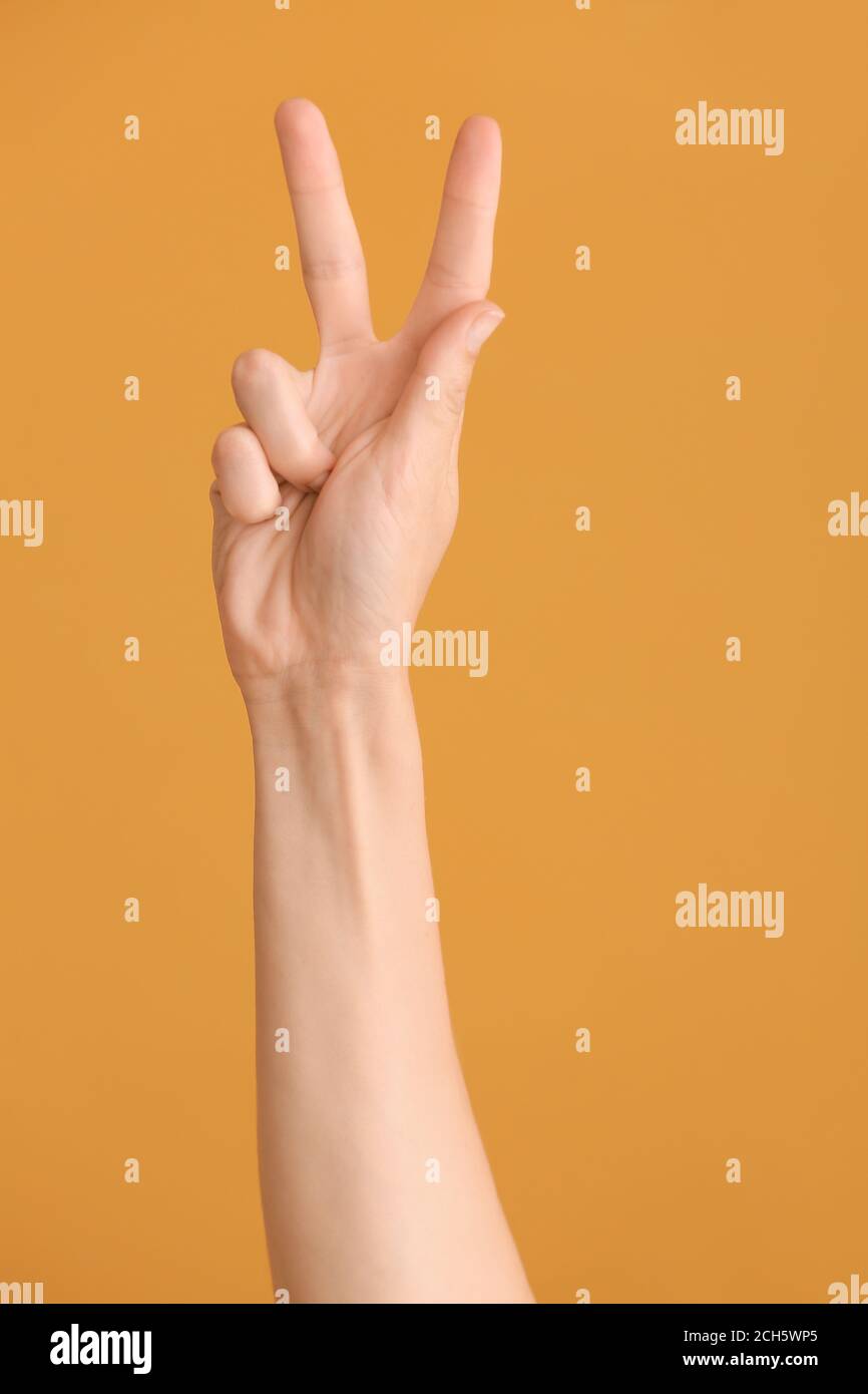 Hand showing letter K on color background. Sign language alphabet Stock ...