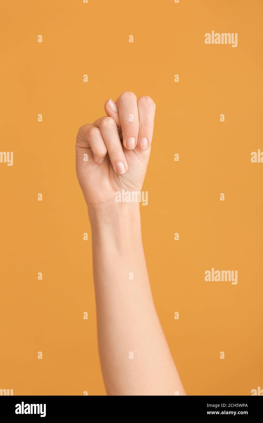 Hand showing letter N on color background. Sign language alphabet Stock ...