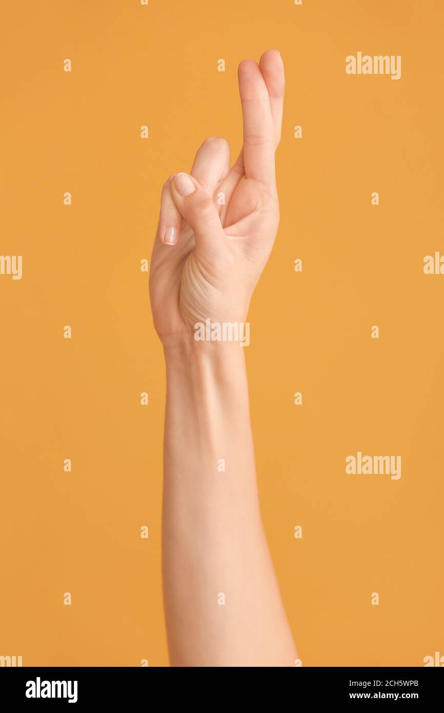 Hand showing letter R on color background. Sign language alphabet Stock ...