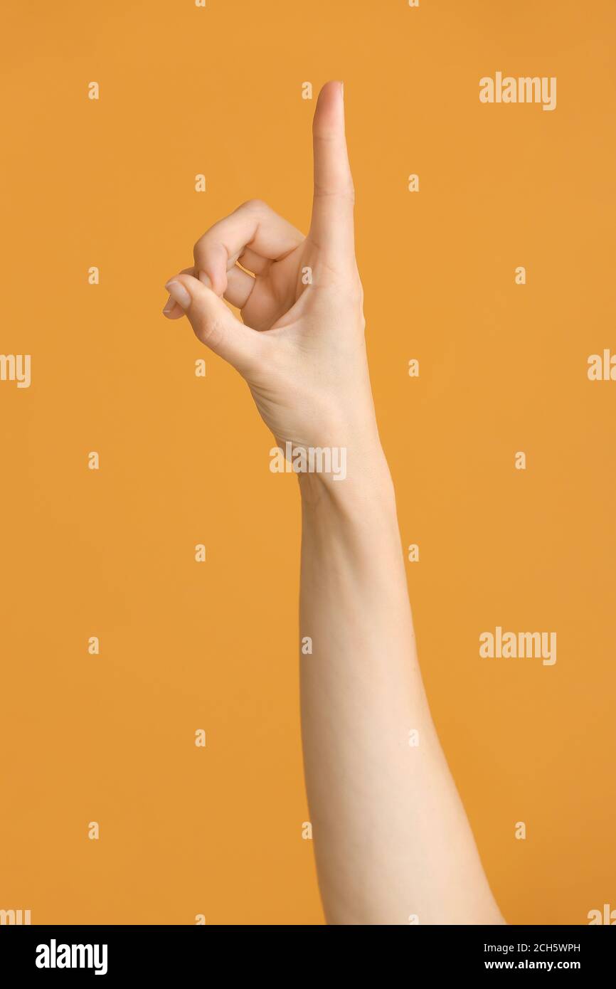 Hand showing letter D on color background. Sign language alphabet Stock ...