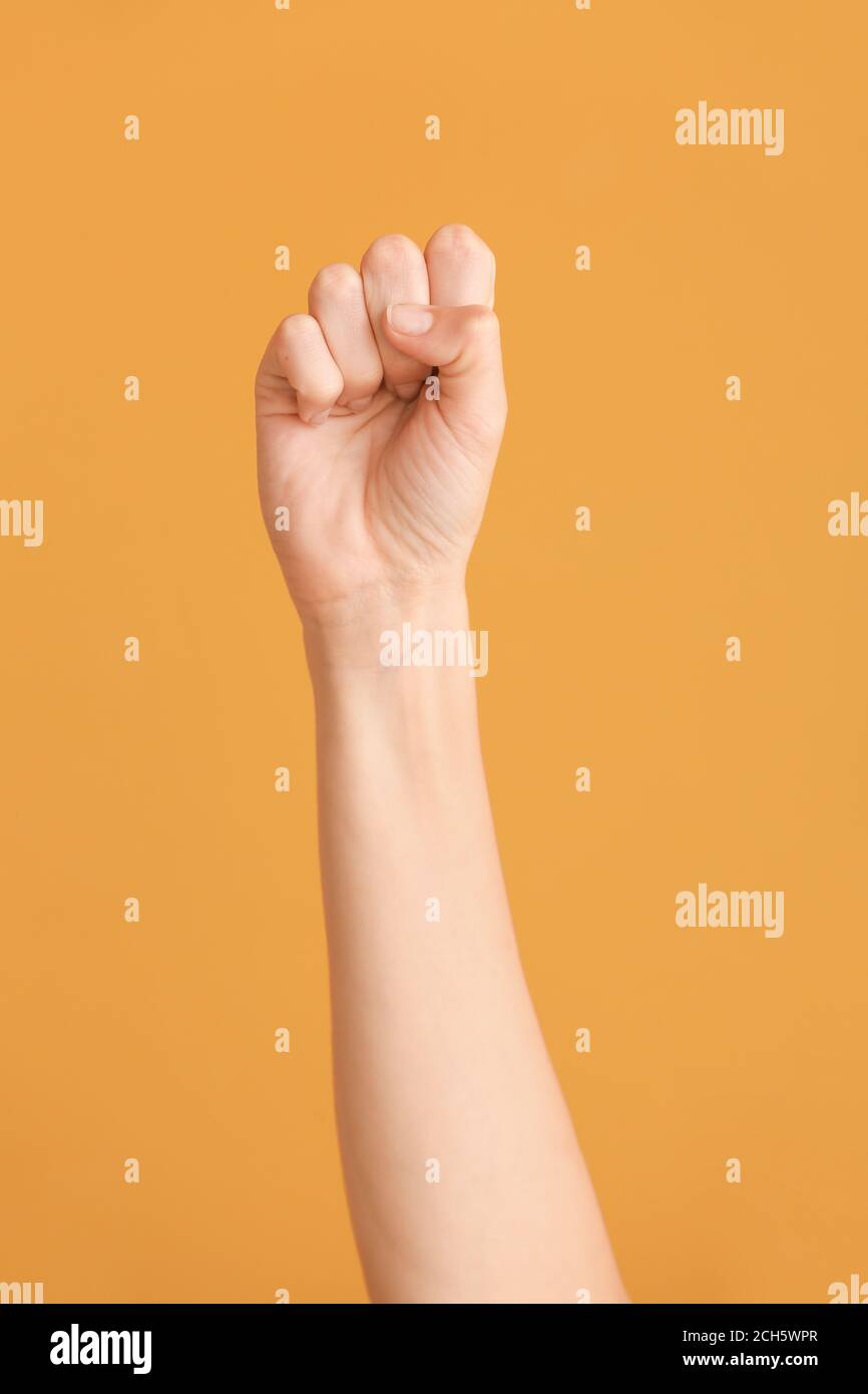 Hand showing letter S on color background. Sign language alphabet Stock ...