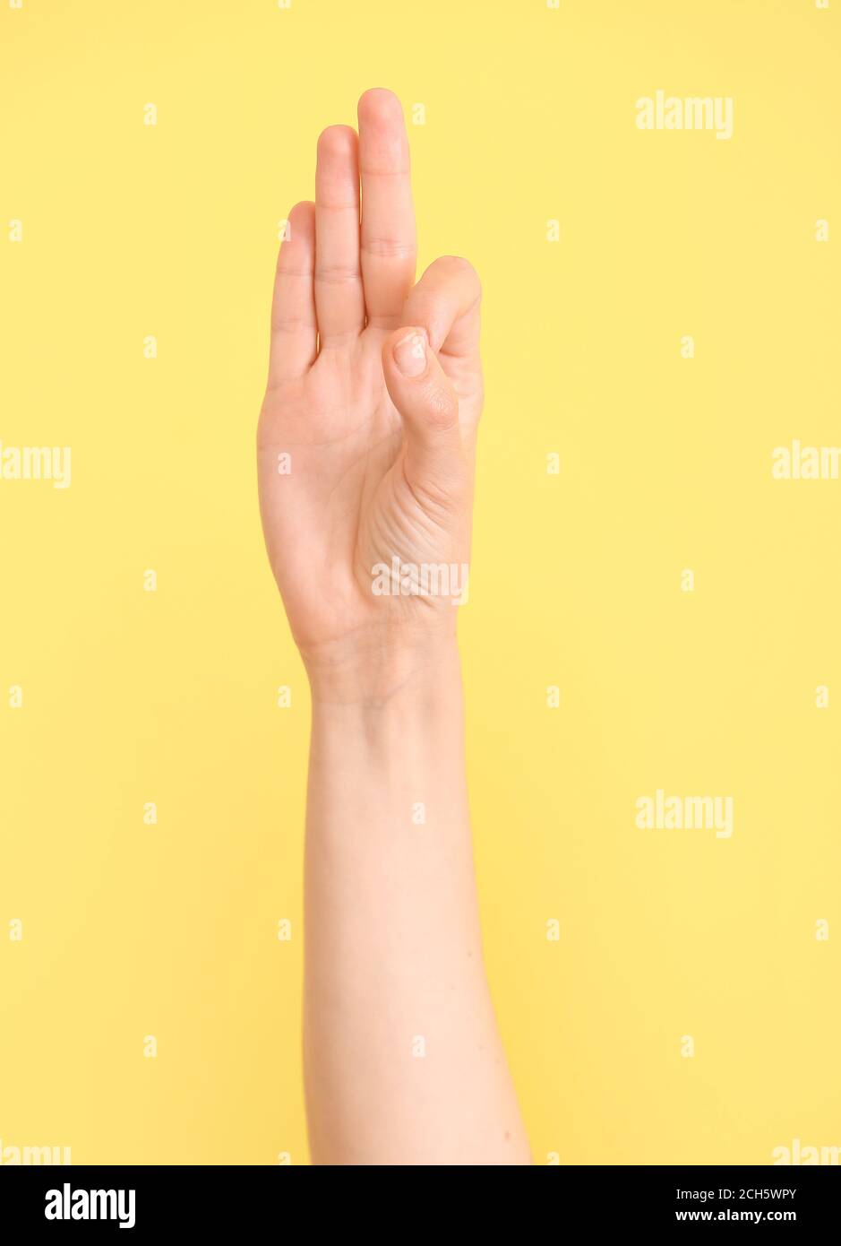 Hand showing letter F on color background. Sign language alphabet Stock ...