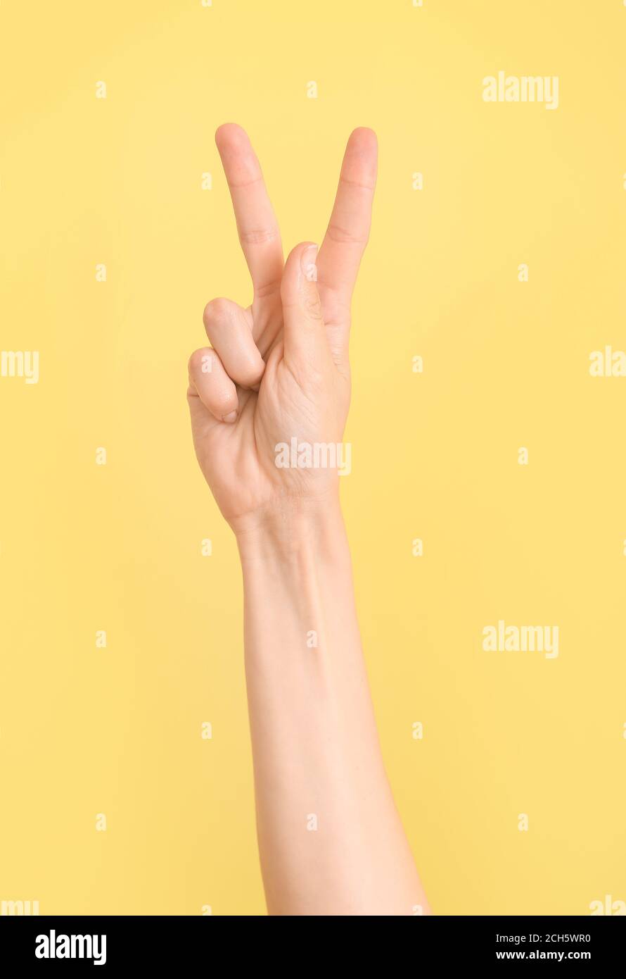 Hand showing letter K on color background. Sign language alphabet Stock ...