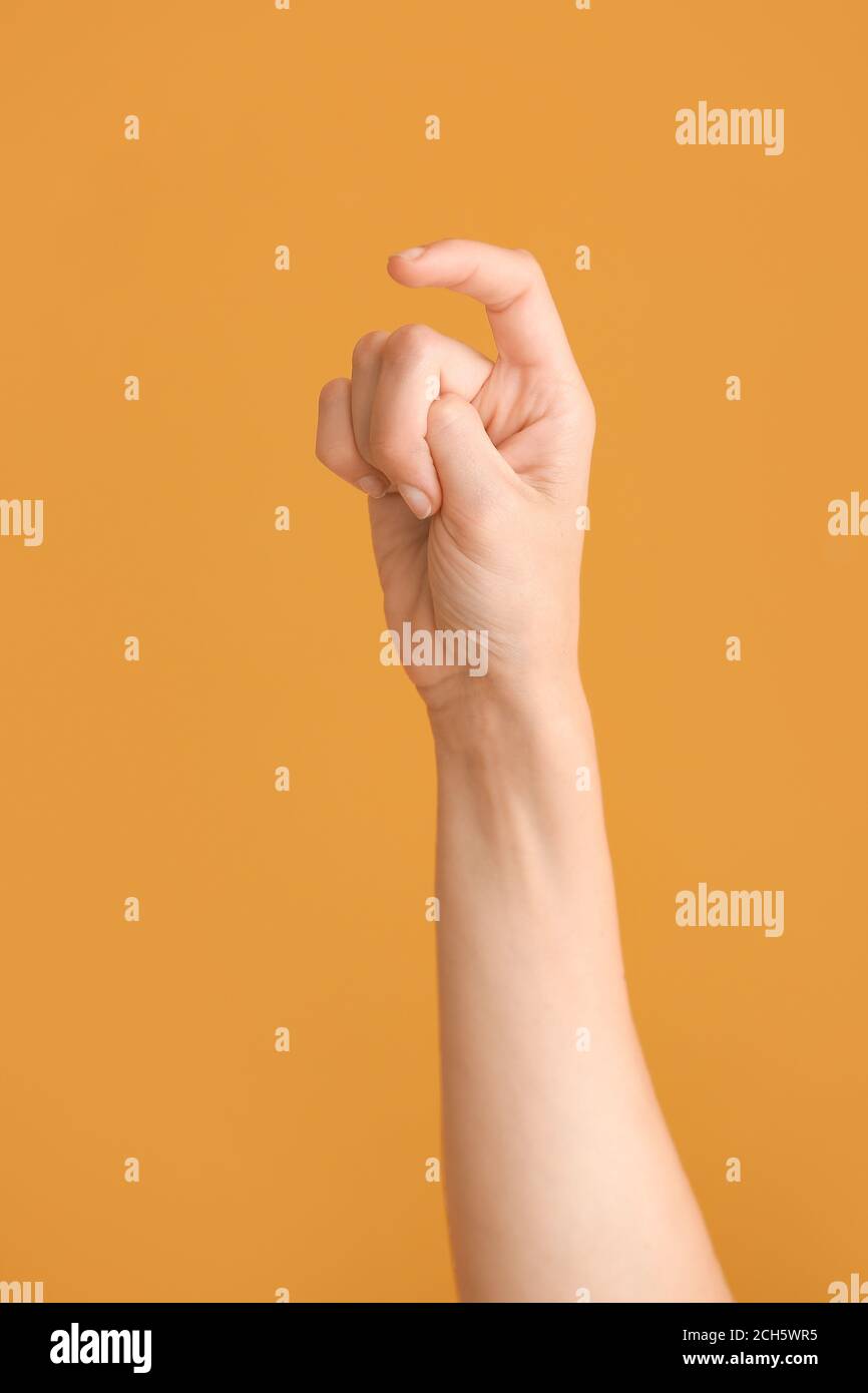 Hand showing letter X on color background. Sign language alphabet Stock ...