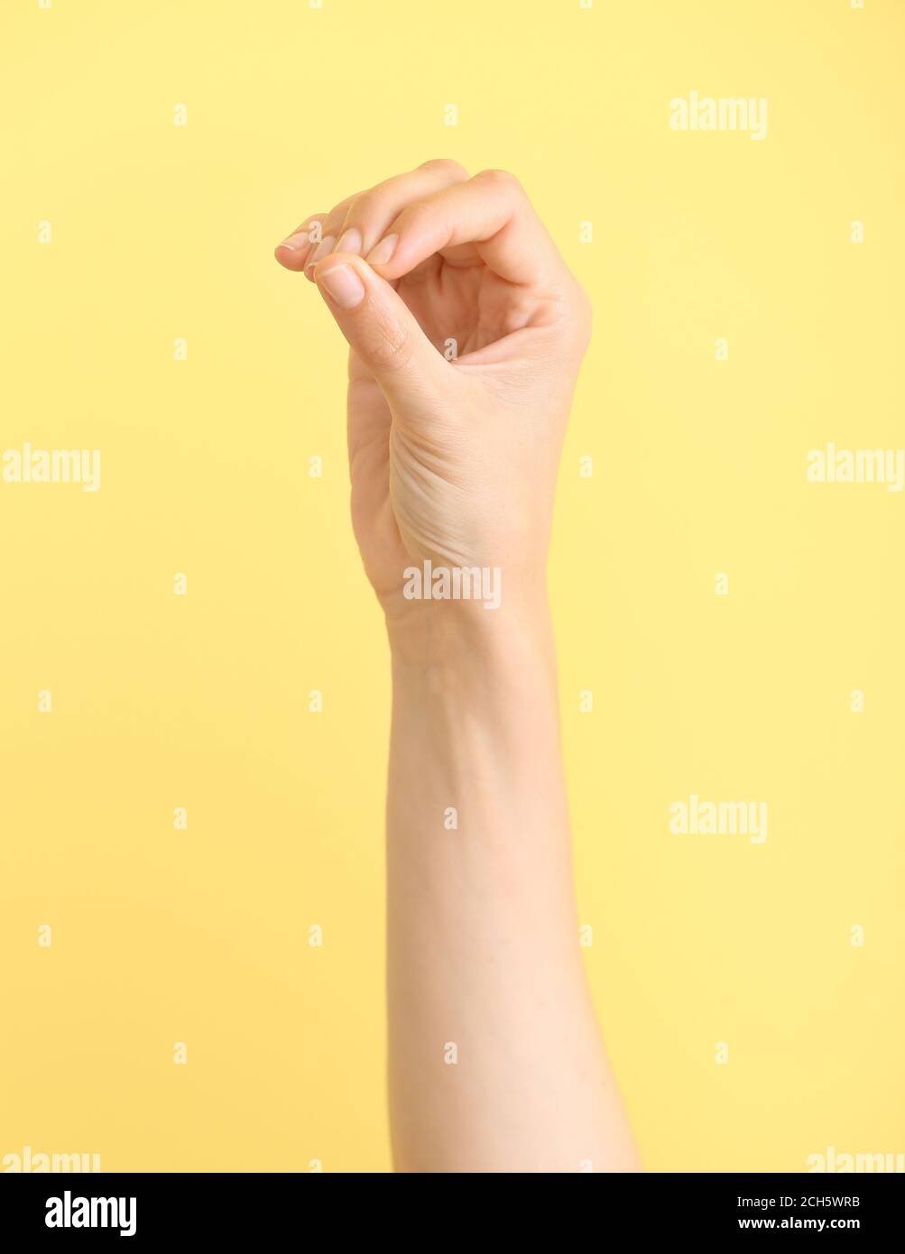 Hand showing letter O on color background. Sign language alphabet Stock ...