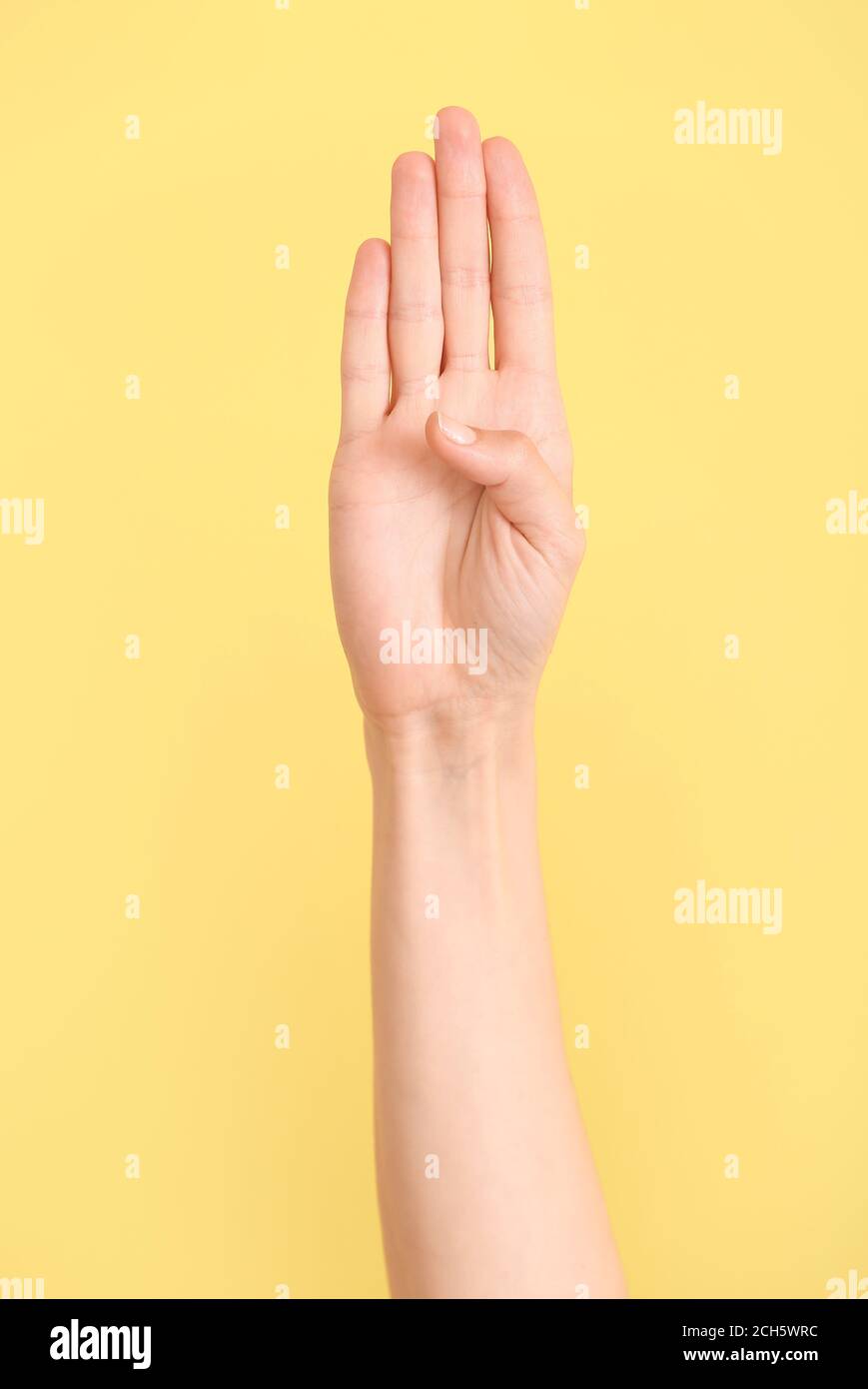 Hand showing letter B on color background. Sign language alphabet Stock ...