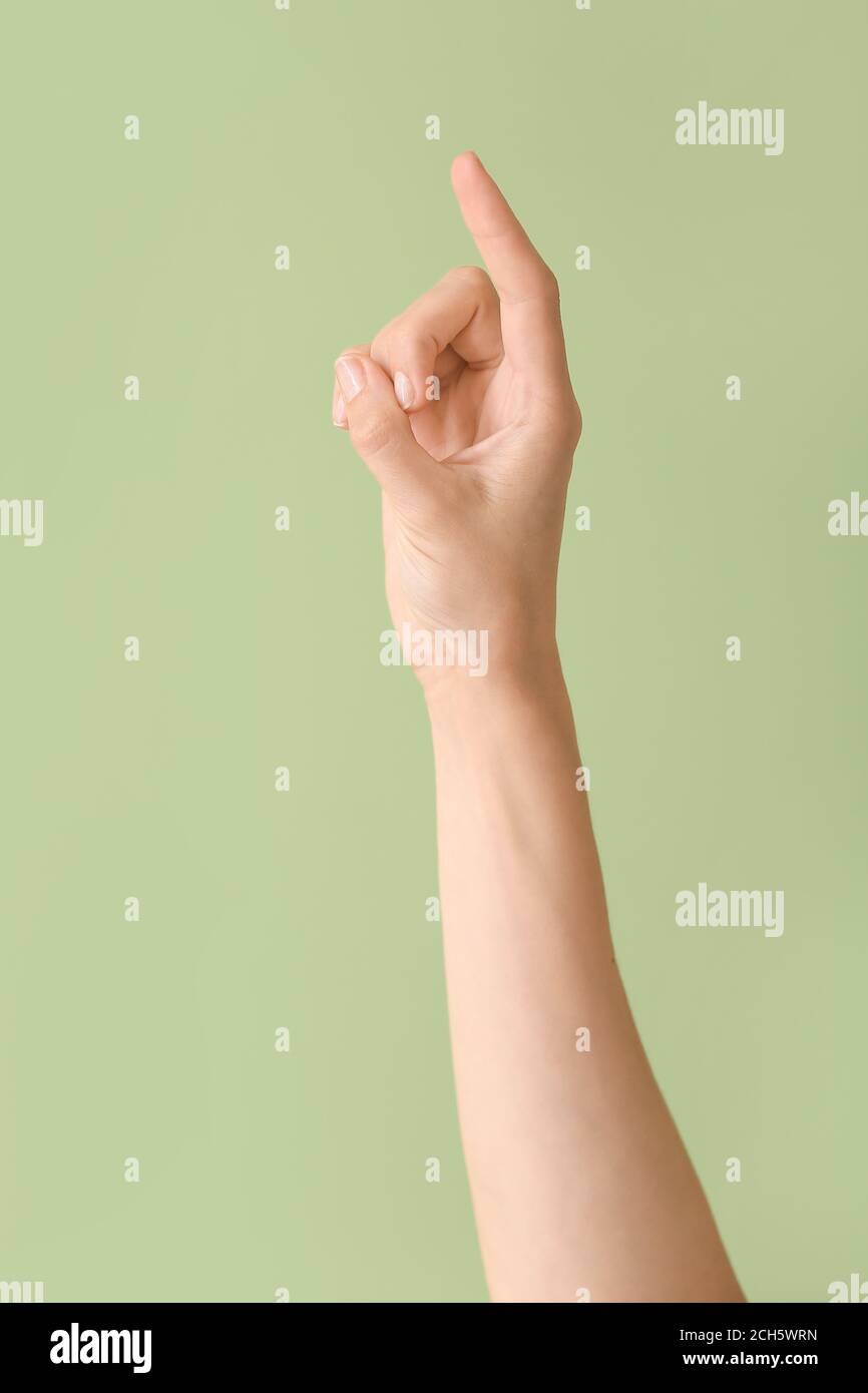 Hand showing letter D on color background. Sign language alphabet Stock ...