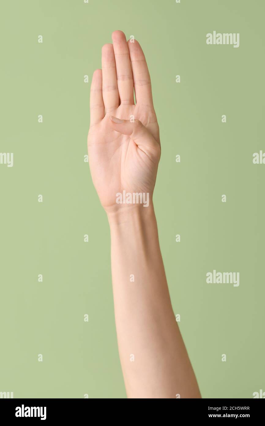 Hand showing letter B on color background. Sign language alphabet Stock ...