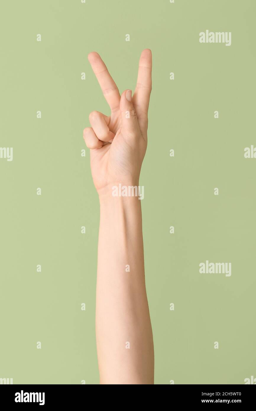 Hand showing letter K on color background. Sign language alphabet Stock ...