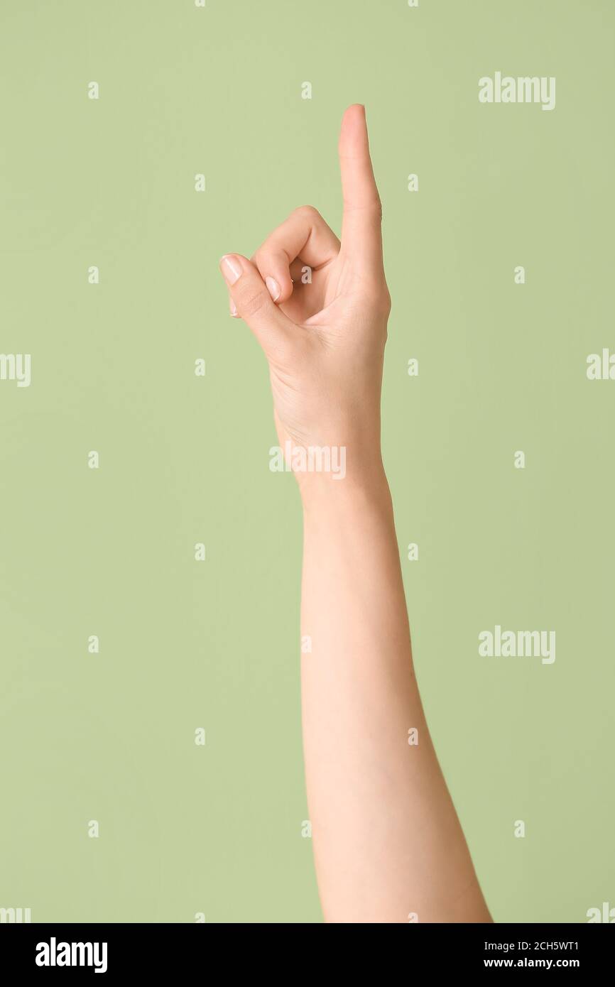 Hand showing letter D on color background. Sign language alphabet Stock ...
