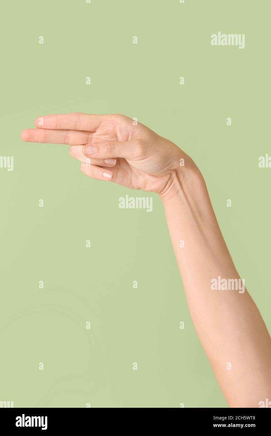 Hand showing letter H on color background. Sign language alphabet Stock ...