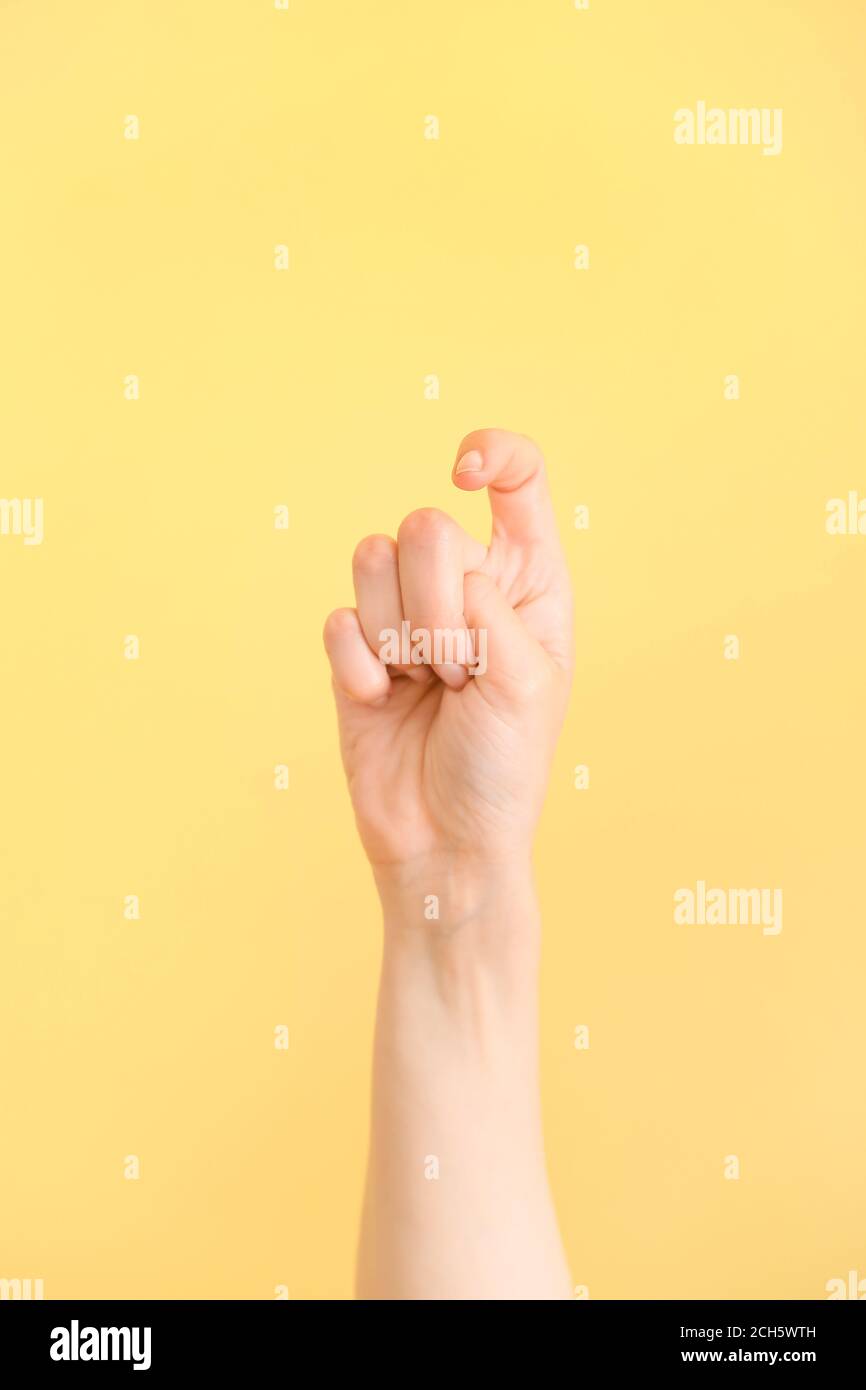 Hand showing letter X on color background. Sign language alphabet Stock ...