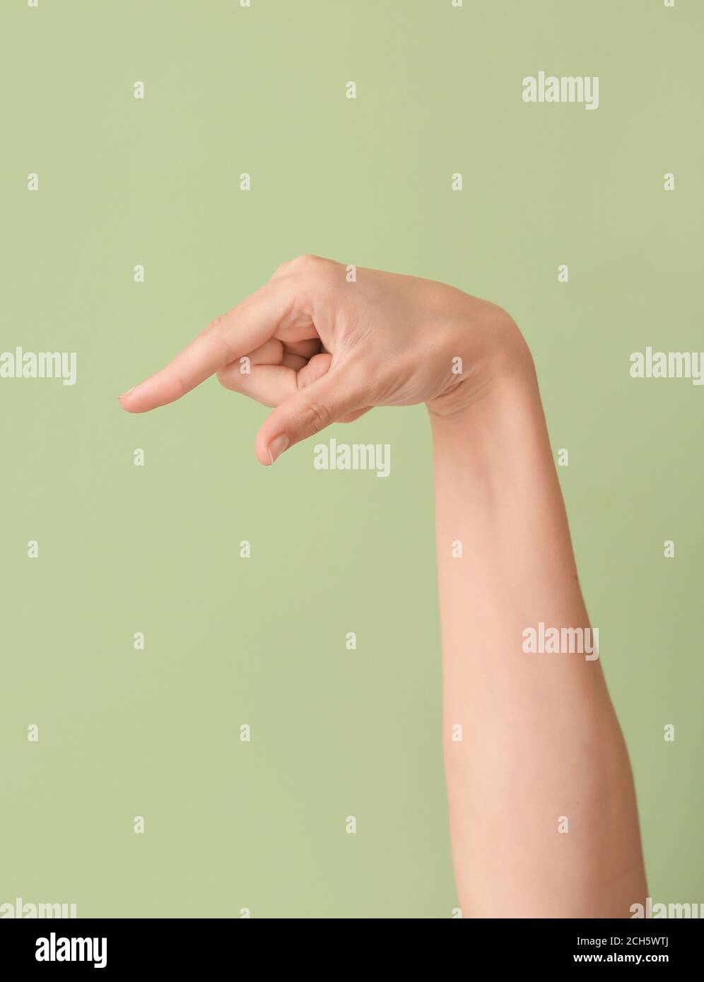 Hand showing letter Q on color background. Sign language alphabet Stock ...