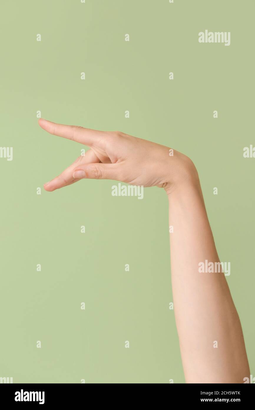 Hand showing letter P on color background. Sign language alphabet Stock ...