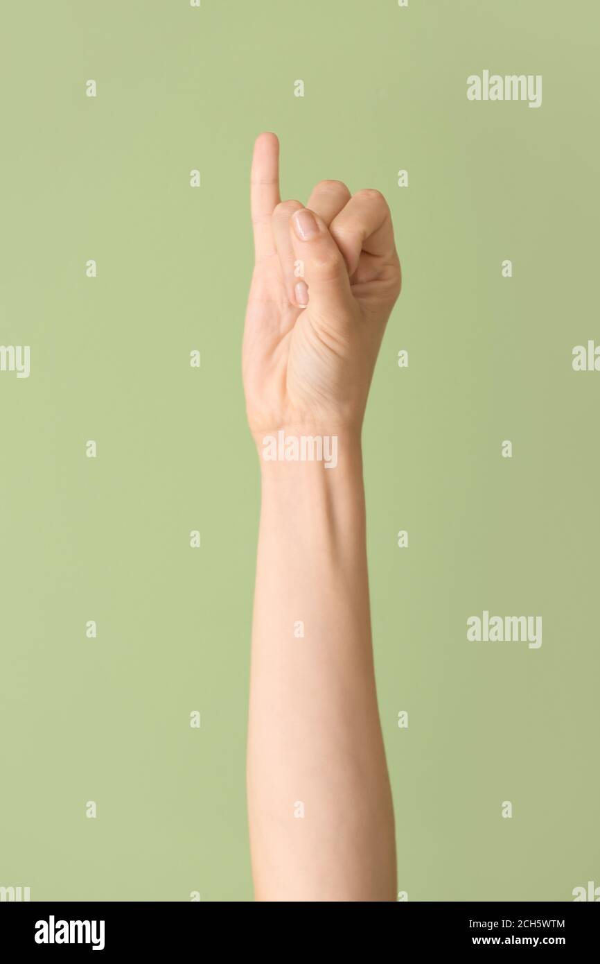 Hand showing letter I on color background. Sign language alphabet Stock ...