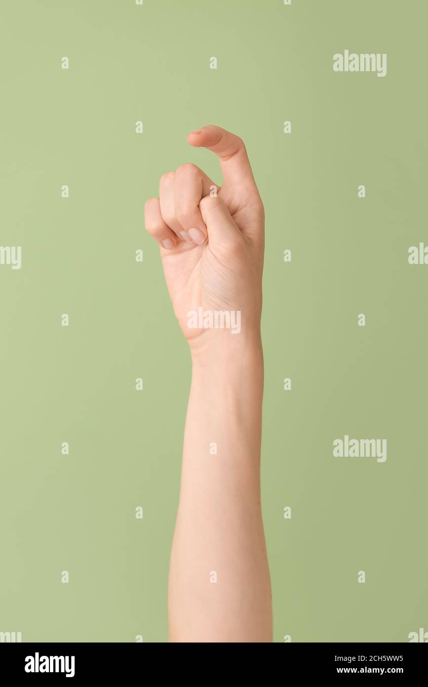 Hand showing letter X on color background. Sign language alphabet Stock ...