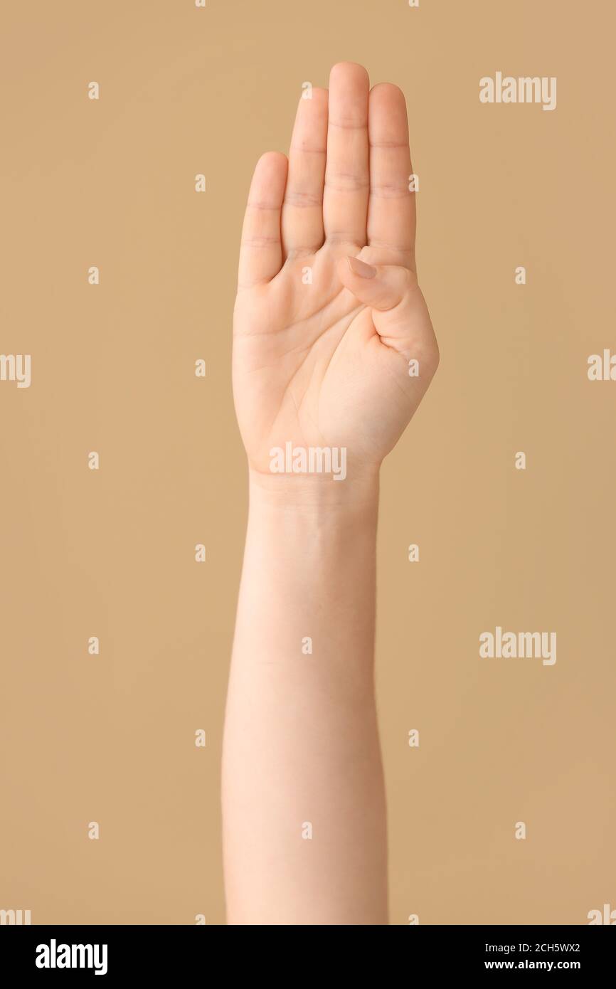 Hand showing letter B on color background. Sign language alphabet Stock ...